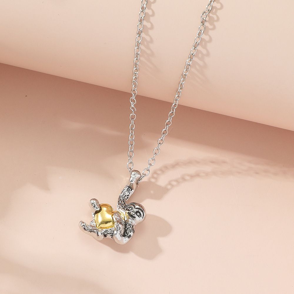 HEART HUGGING SLOTH NECKLACE – Ashlen